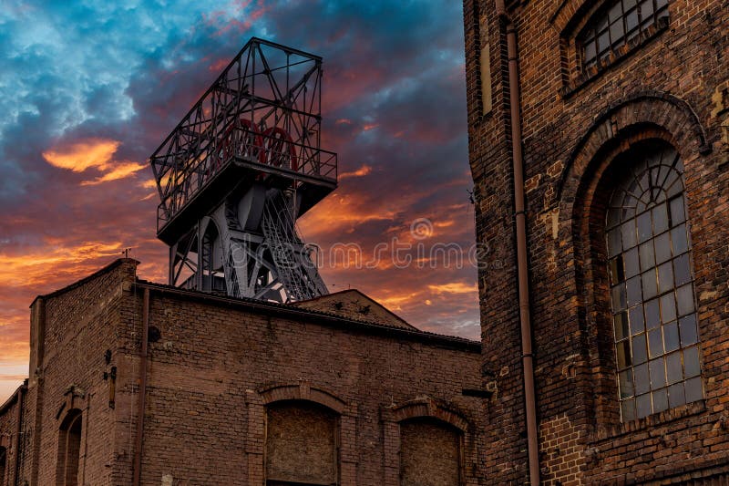 Coal Mine Shaft in Katowice. Old Red Brick Mine Buildings. Stock Photo ...