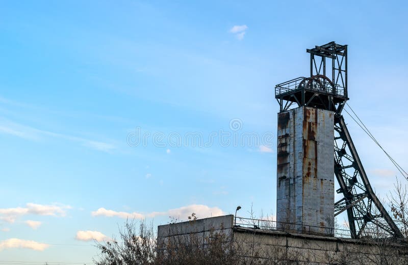 Coal Mine with Wheels. Colliery Against the Blue Sky Stock Photo ...