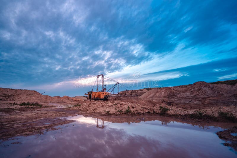 Sunset at the mine stock image. Image of yellow, blue - 124220261