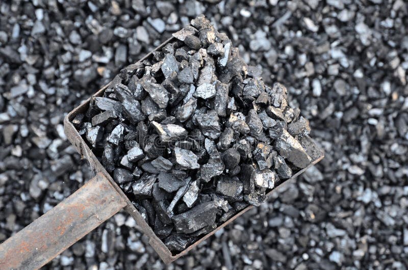 Coal pile and coal scoop. stock image. Image of background - 365934735