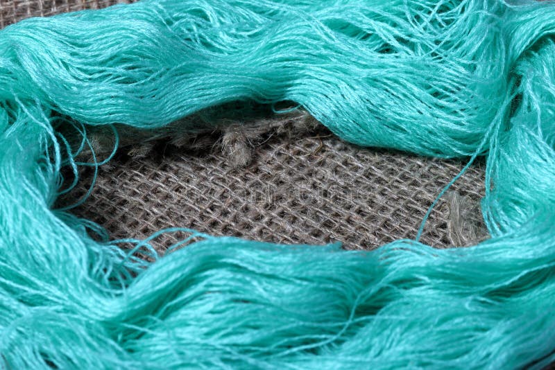 Coarse Linen Fabric. on it are Hanks of Green Threads Stock Image ...