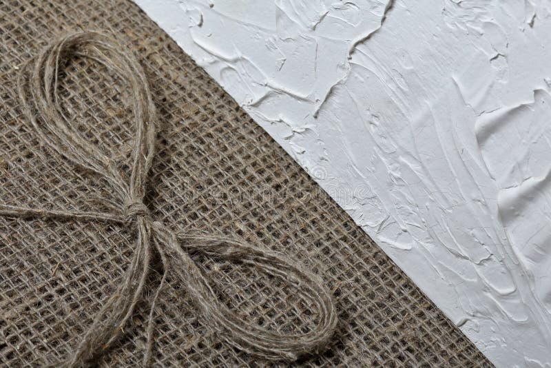 Coarse Linen Fabric. on it Lies a Bow of Linen Thread Stock Photo ...