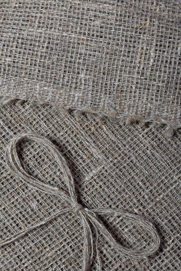Coarse Linen Fabric. on it Lies a Bow of Linen Thread Stock Photo ...