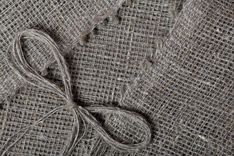 Coarse Linen Fabric. on it Lies a Bow of Linen Thread Stock Photo ...