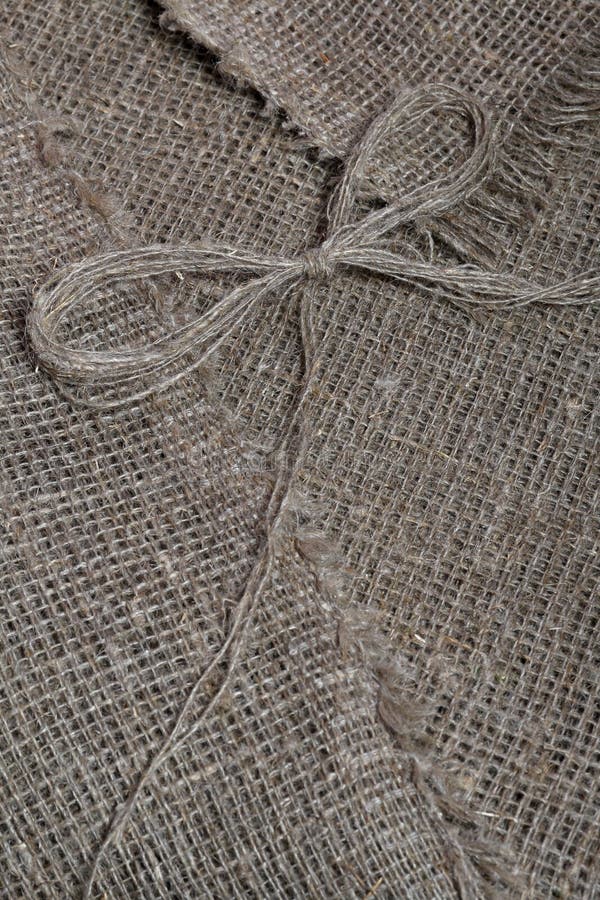 Coarse Linen Fabric. on it Lies a Bow of Linen Thread Stock Photo ...