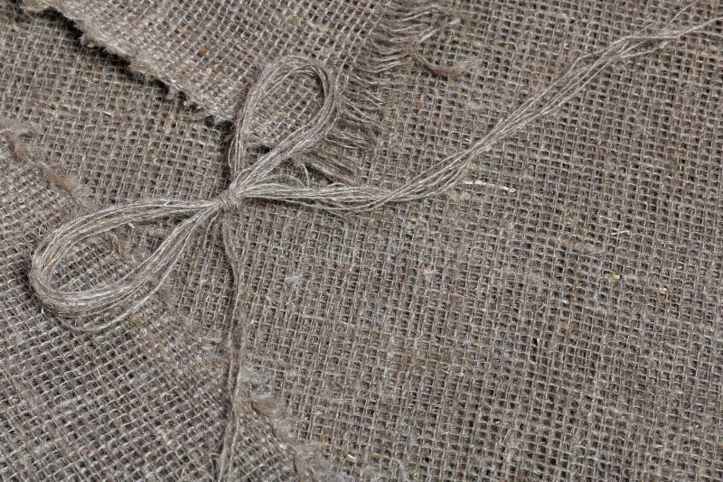 Coarse Linen Fabric. on it Lies a Bow of Linen Thread Stock Photo ...