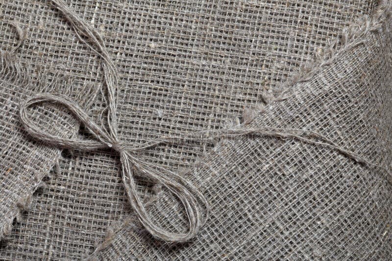 Coarse Linen Fabric. on it Lies a Bow of Linen Thread Stock Image ...