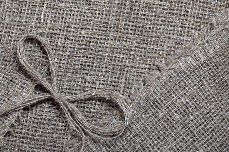Coarse Linen Fabric. on it Lies a Bow of Linen Thread Stock Image ...