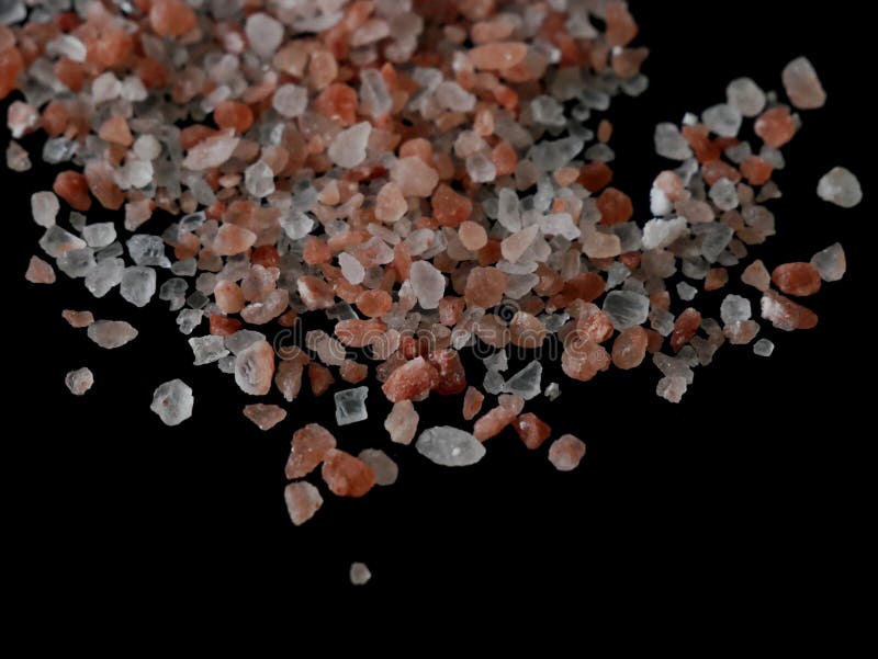 Coarse Pink Himalayan Salt Crystals Isolated on Black Background Close ...