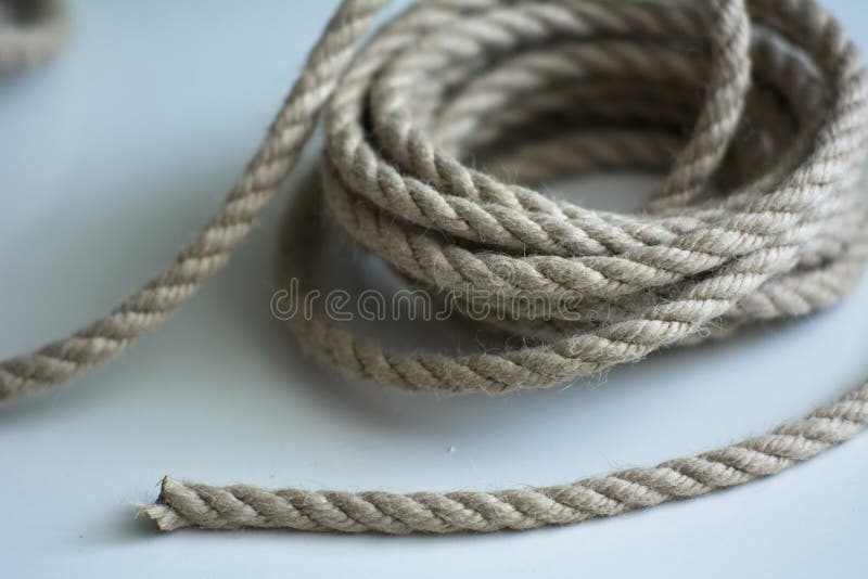 Coarse Rope Roll on a Light Surface Stock Image - Image of loop, angle ...