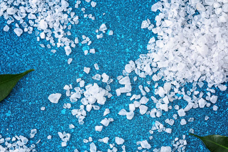 Coarse Salt Crystals on Blue Table. Sea Salt. Background for ...