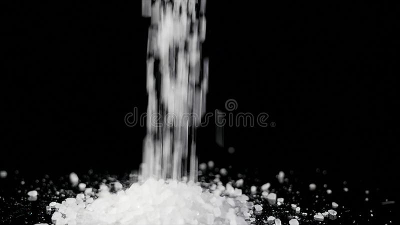 Coarse Sea Salt Crystal Falling on Black Background Stock Video - Video ...