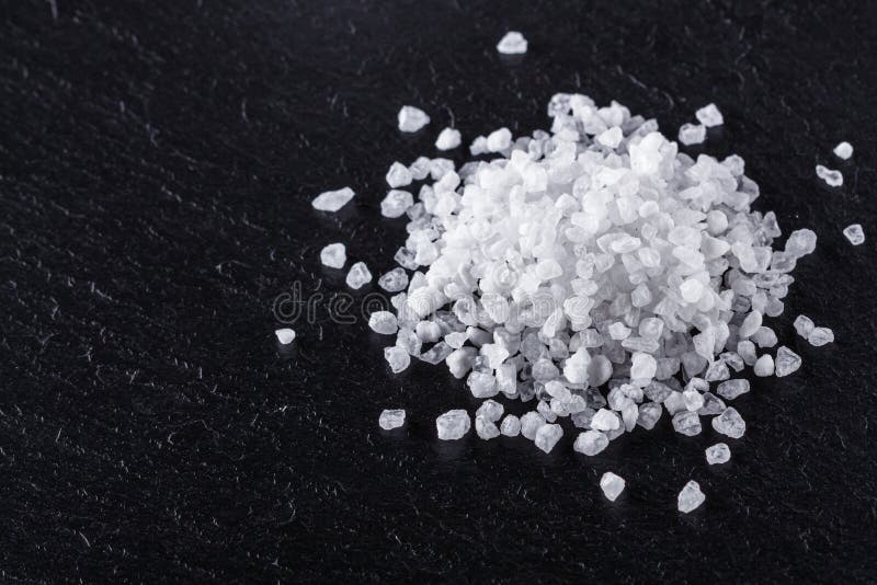 Coarse Sea Salt on a Dark Stone Background Stock Image - Image of grain ...