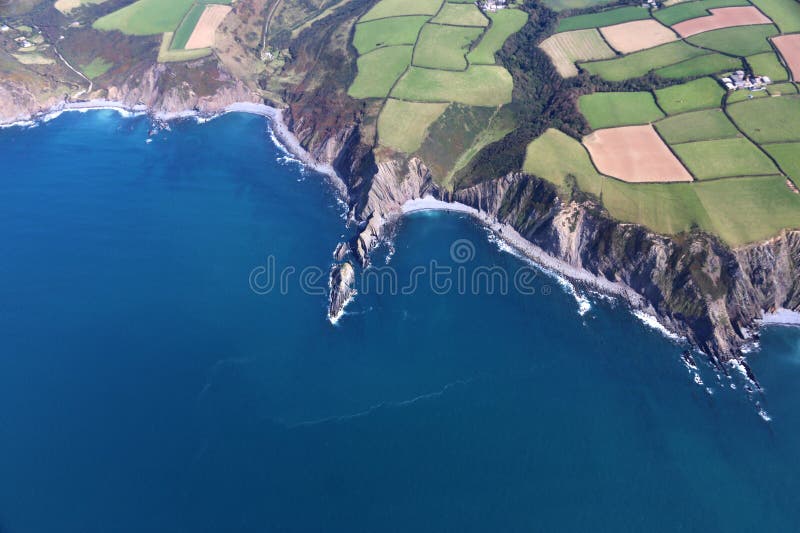 Red cliffs in Devon. stock photo. Image of headland, bedrock - 50289230