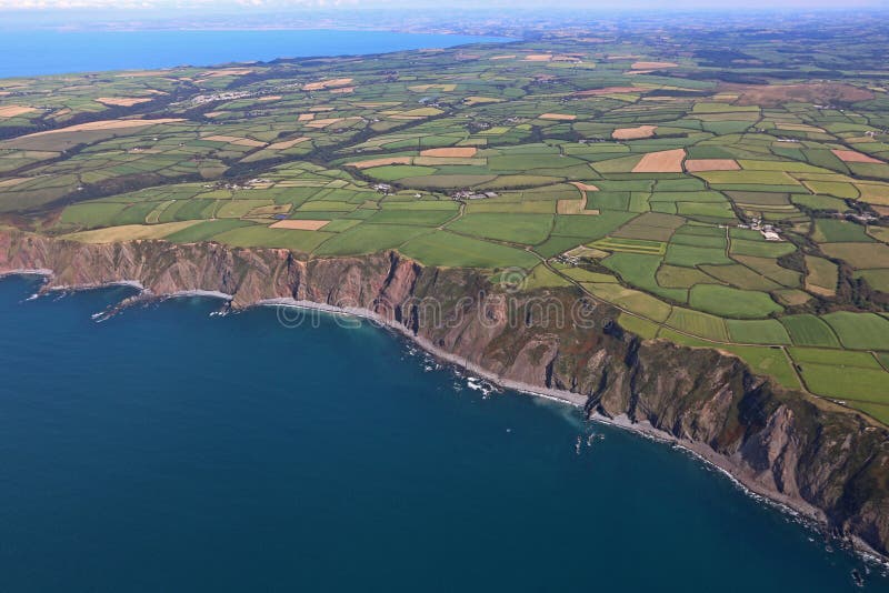 Red cliffs in Devon. stock photo. Image of headland, bedrock - 50289230