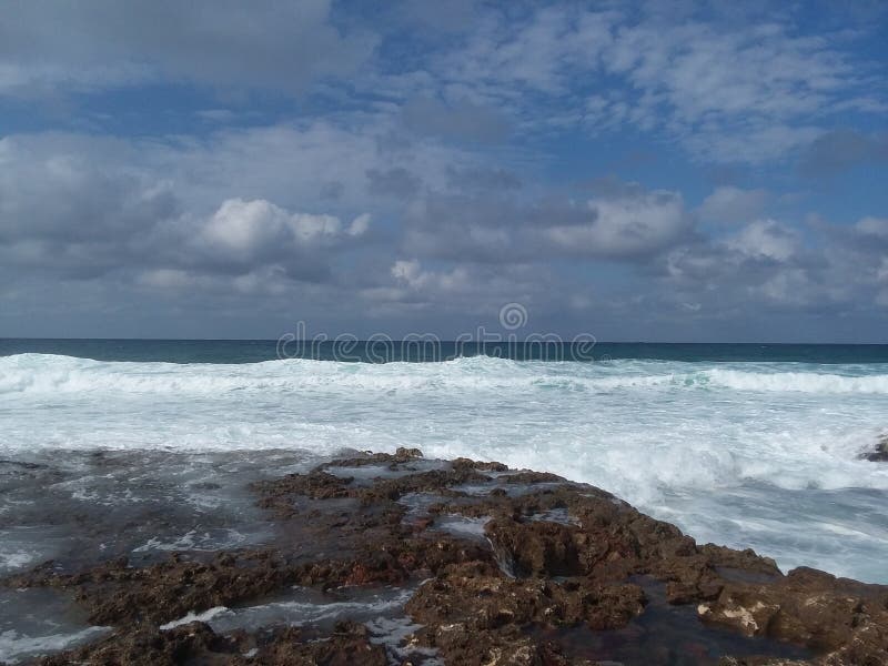 Wild wave coast stock photo. Image of rock, sand, cloud - 359972578