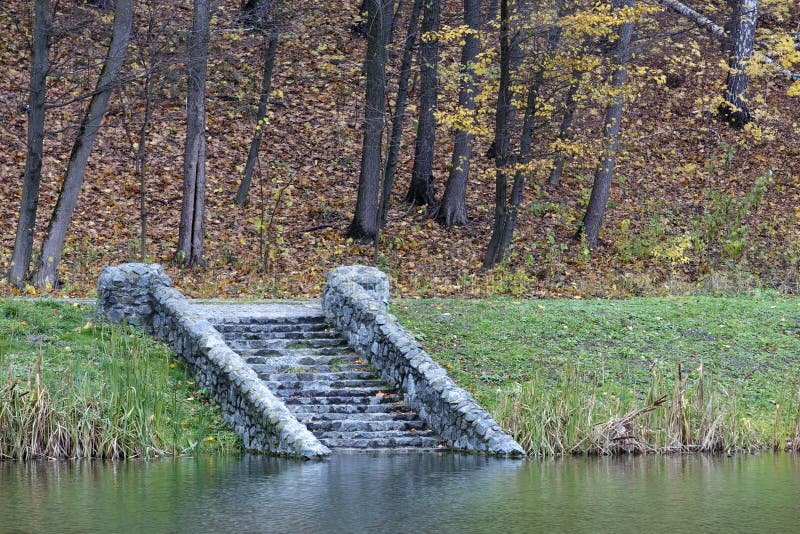 Old Steps of Stone Descent on the Shore of a Forest Pond. Stock Image ...