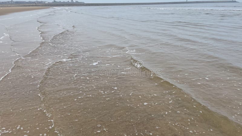 Over Cast Beach Coast Line with Waves Stock Photo - Image of line ...