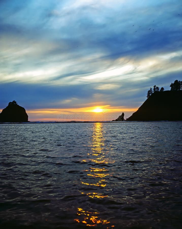 Coast of Oregon at sunset stock photo. Image of island - 263655892