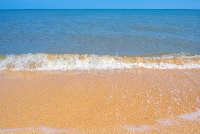 The Coast of Sea of Azov. Sea Waves Roll on the Sandy Shore. Seashell ...