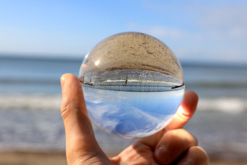 The Coast of Sea in the Glass Ball Stock Image - Image of water, beach ...