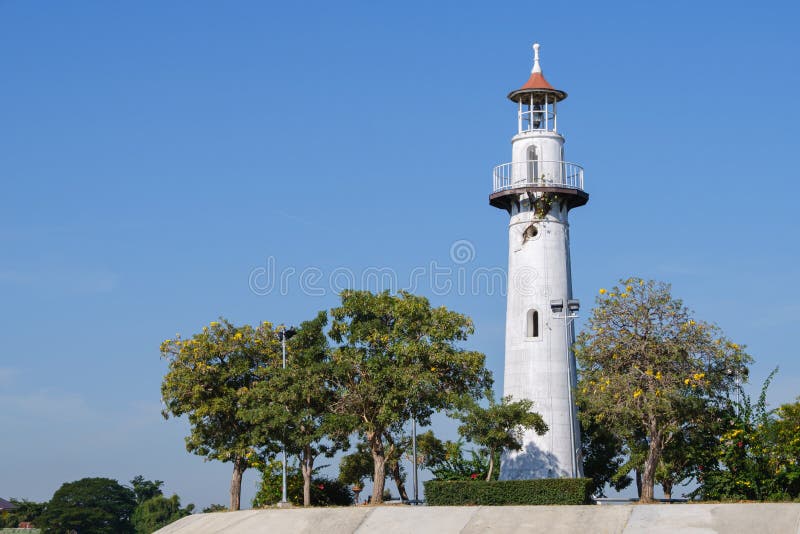 Lighthouse with blue sky stock photo. Image of cloud, water - 1097004
