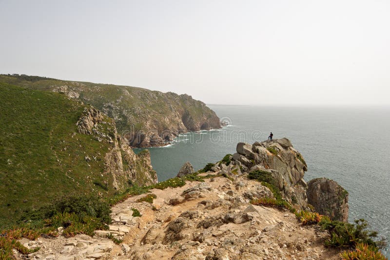 Coastal Cliffs and Lone Person at Cabo Da Roca, Portugal Stock Photo ...