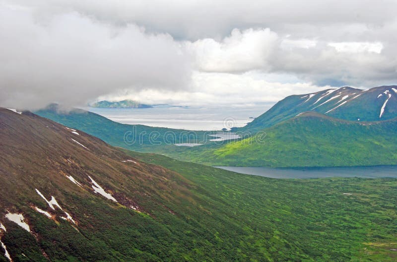 Coastal Clouds Over Island Hills Stock Image - Image of kodiak, green ...