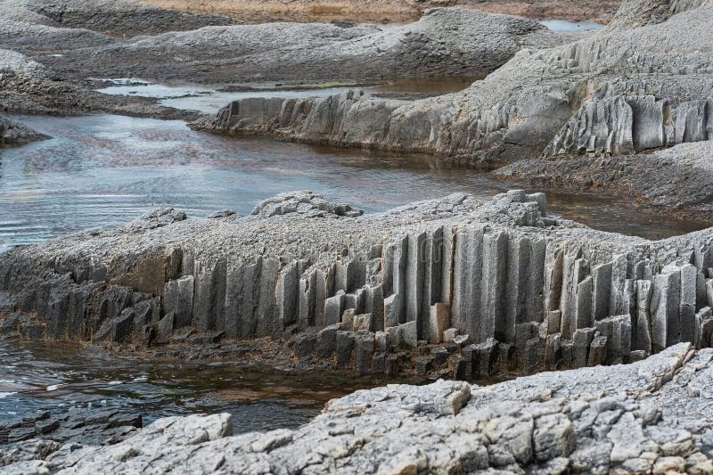 Coastal Landscape with Beautiful Columnar Basalt Cliffs at Low Tide ...
