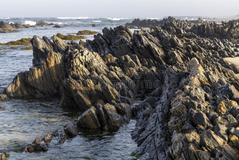 Coastal Rock Formation stock photo. Image of coastline - 384954864