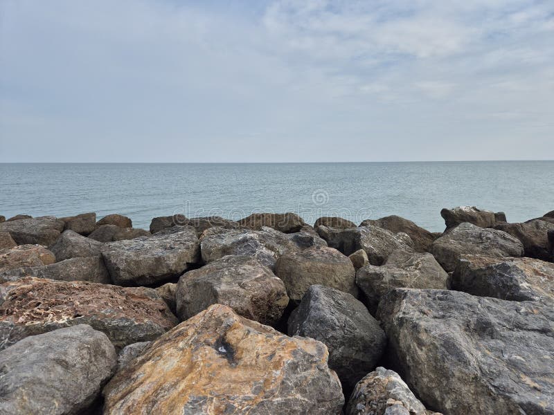 Coastal Rock Wall and Blue Sky Stock Image - Image of rock, wall: 352942513