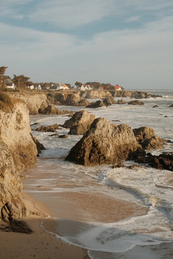 Coastal Rocks Along a Sandy Shoreline. Batz Sur Mer Editorial Photo ...