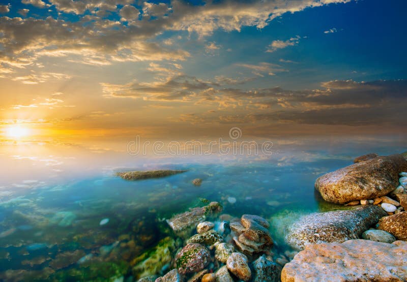 Coastal rocks and sunset stock photo. Image of ocean - 34372316