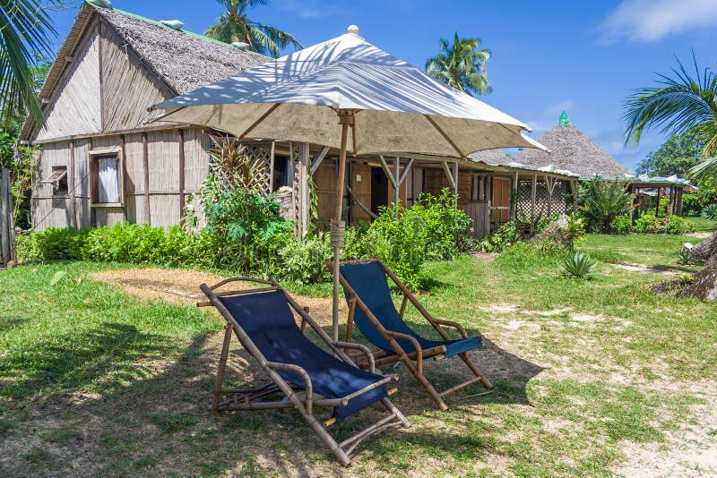 Straw house on a beach stock photo. Image of holiday - 25341886
