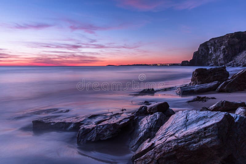Coastal sunset on rocky beach in Cornwall, England, Dreamy sunset in ...