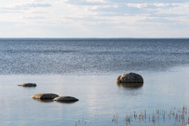 Rocks in Calm Water stock image. Image of landscape, ripple - 76484669