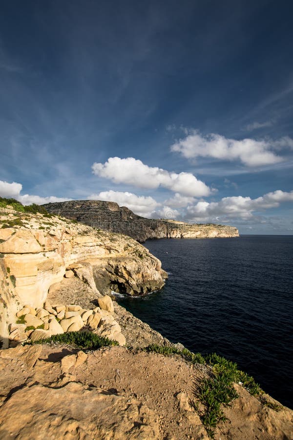 Coast and cliffs of Malta stock photo. Image of water - 107039574