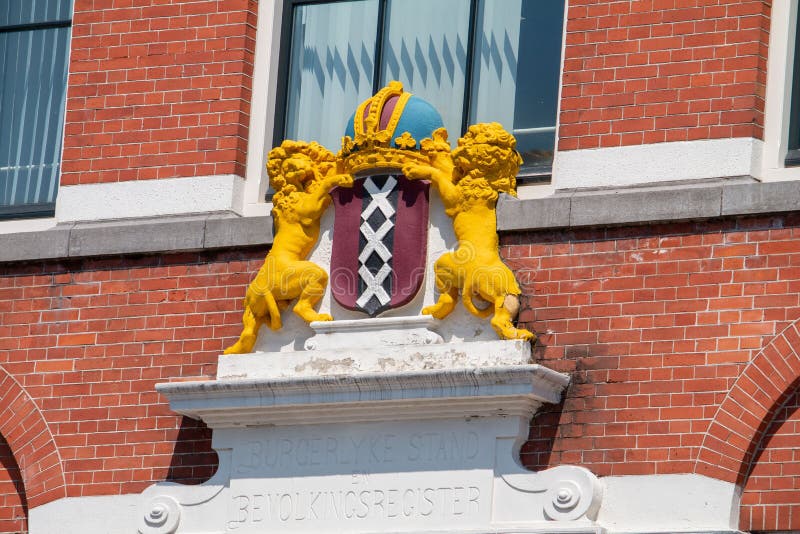 Coat of Arms of Amsterdam on the Facade of a Brick Building Stock Photo ...