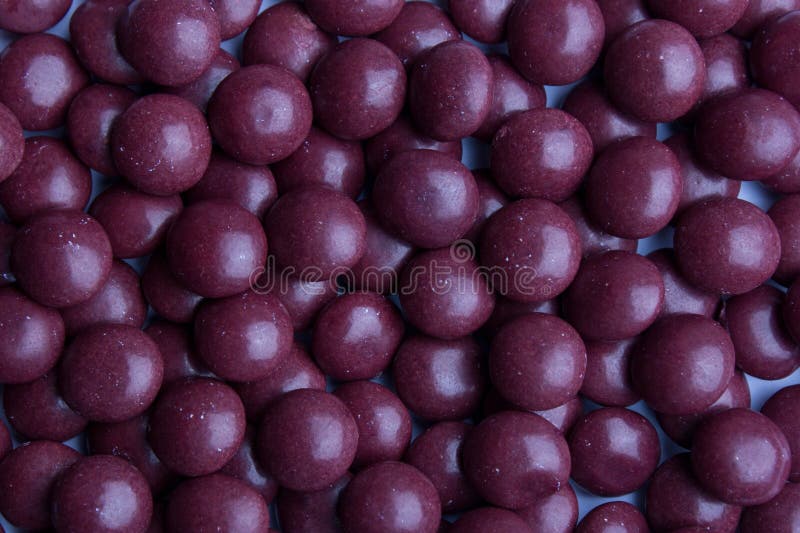 Purple Candy Covered Chocolates Stock Photo - Image of purple, flavored ...