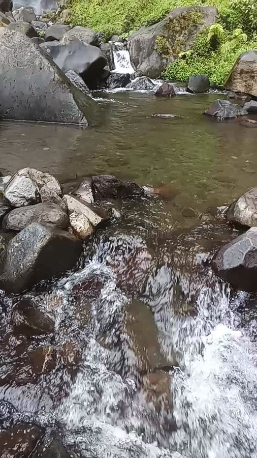 Coban Rondo Waterfall stock footage. Video of rock, holiday - 280947808