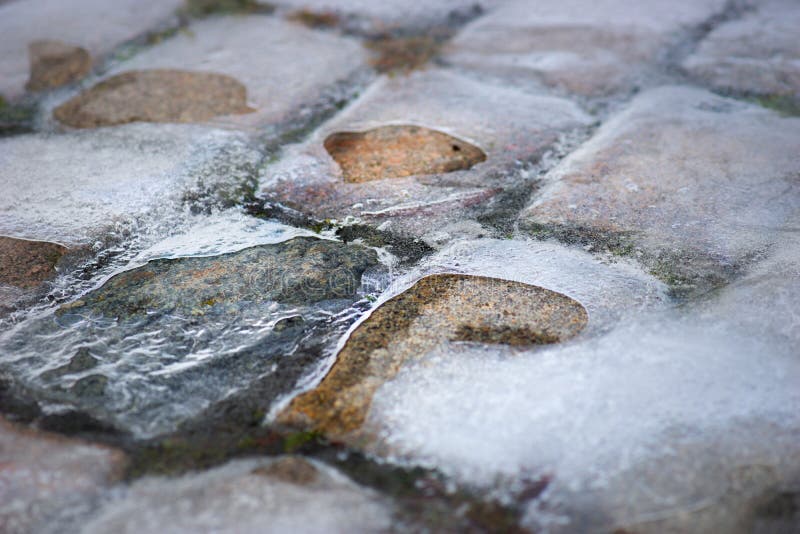 Cobble Stones Covered in Ice Stock Photo - Image of close, cold: 49124846