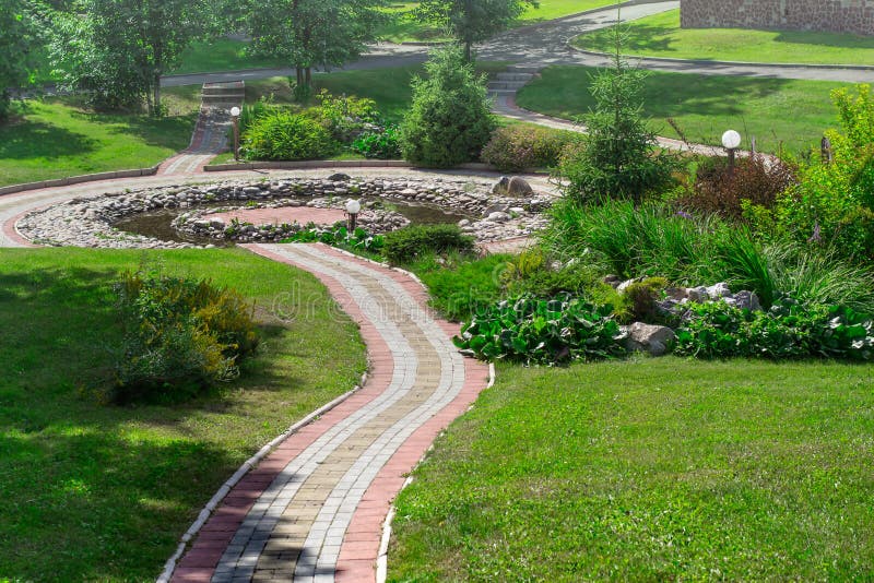 Cobbled Path in the Park and Decorative Pond. Landscape Design Concept ...