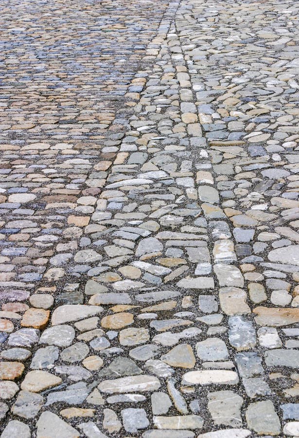 Cobbled or Stone Paved Road Creating a Geometric Pattern from Th Stock ...
