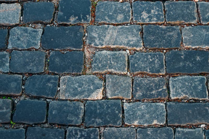 Cobbled Stone Road Shown at a Small Angle, Reflection of Light Seen on ...