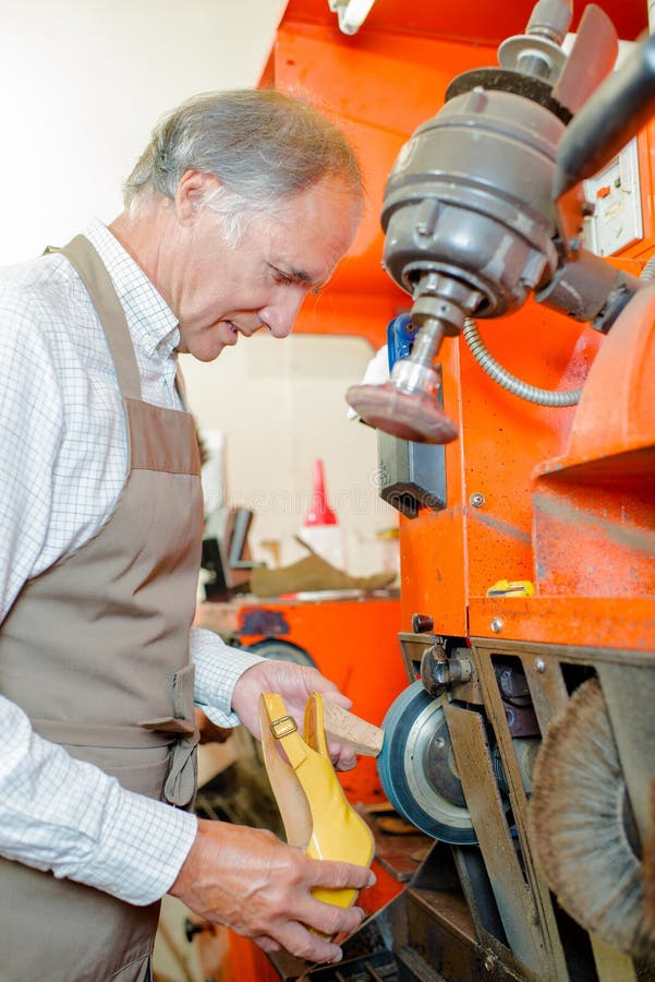 Cobbler repairing a heel stock image. Image of dust - 124184301