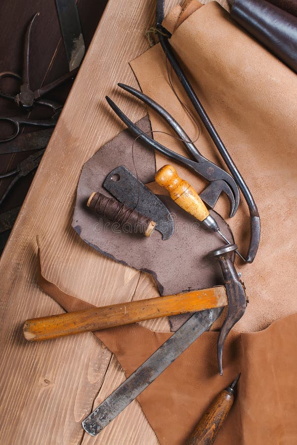 Cobbler Tools in Workshop on the Wooden Table . Top View. Stock Photo ...