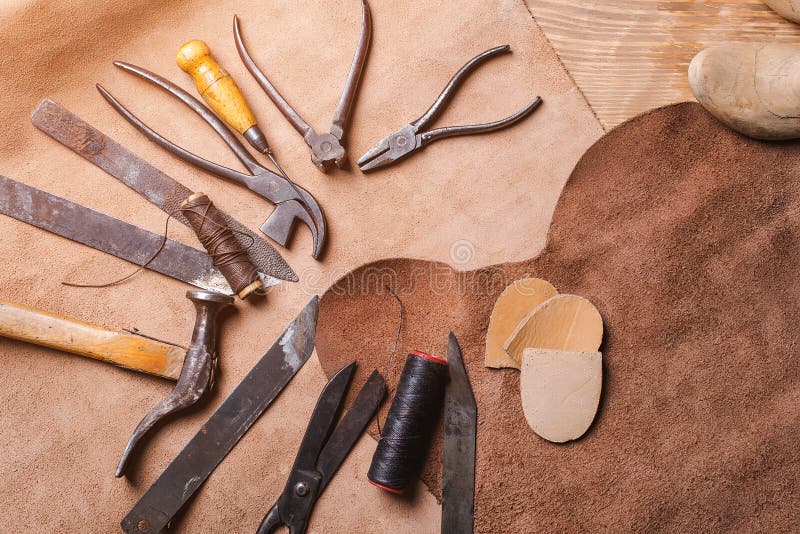 Cobbler Tools in Workshop on the Wooden Table . Top View. Stock Image ...