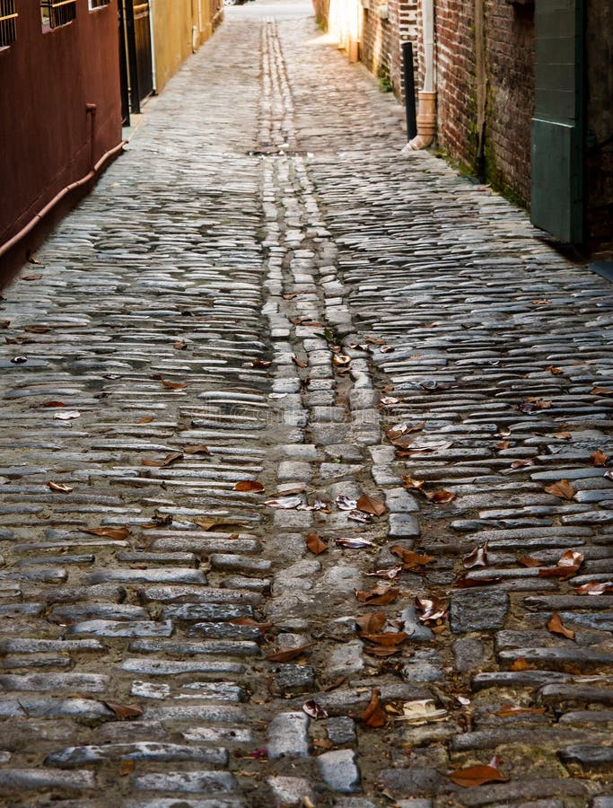 Cobblestone Alleyway stock photo. Image of pavers, sidewalk - 28668974