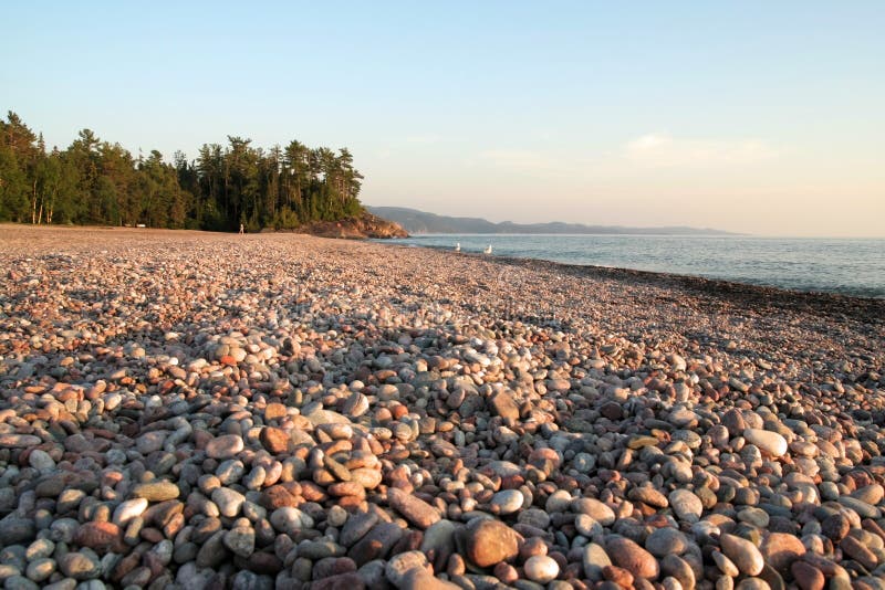 Cobblestone Beach at Agawa Bay Stock Photo - Image of vacation, pebbles ...