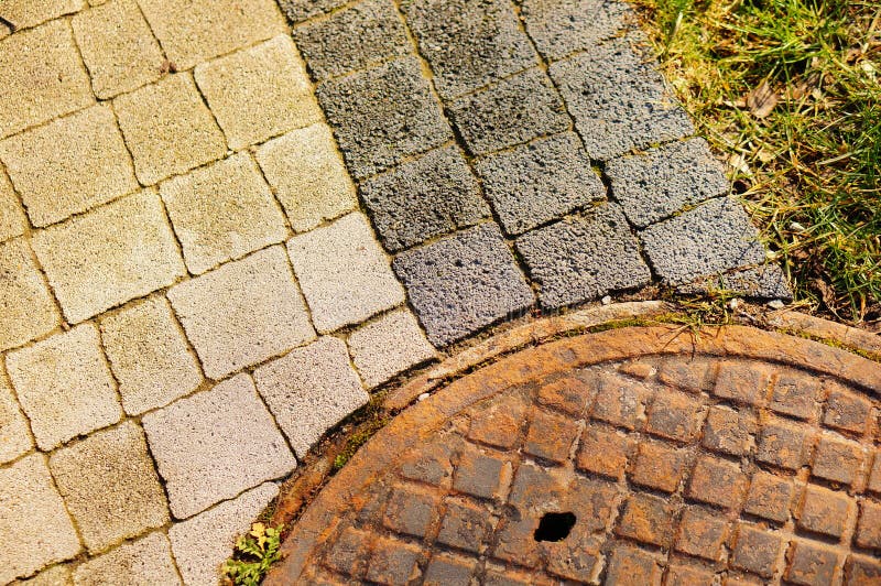 Cobblestone Ground Near a Grassy Field Stock Photo - Image of cobble ...